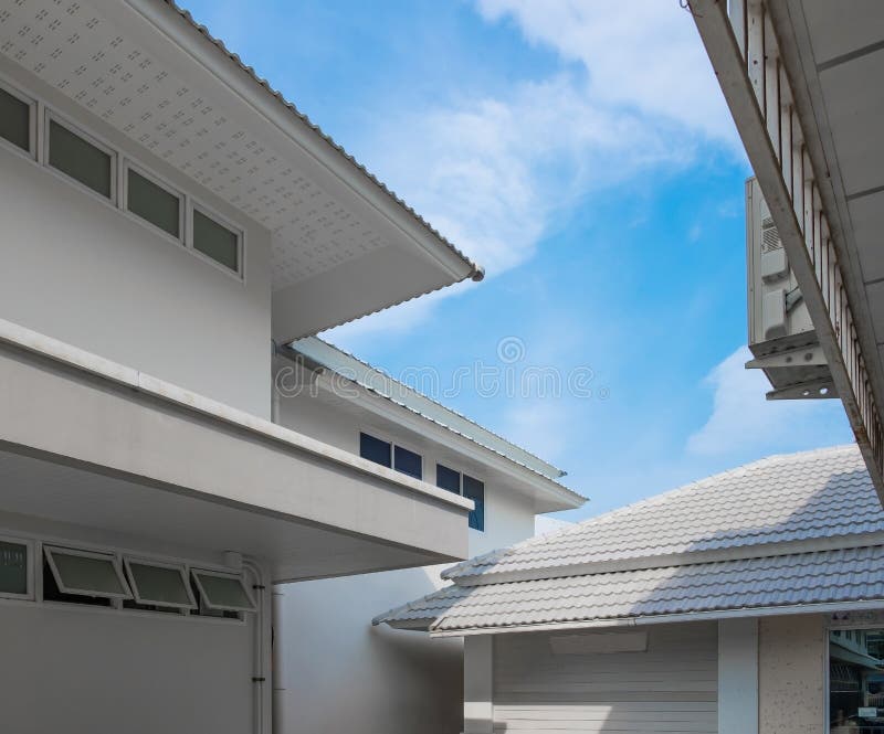 White Eaves With Ceiling And Roof Of Modern House Against Blue S Stock ...