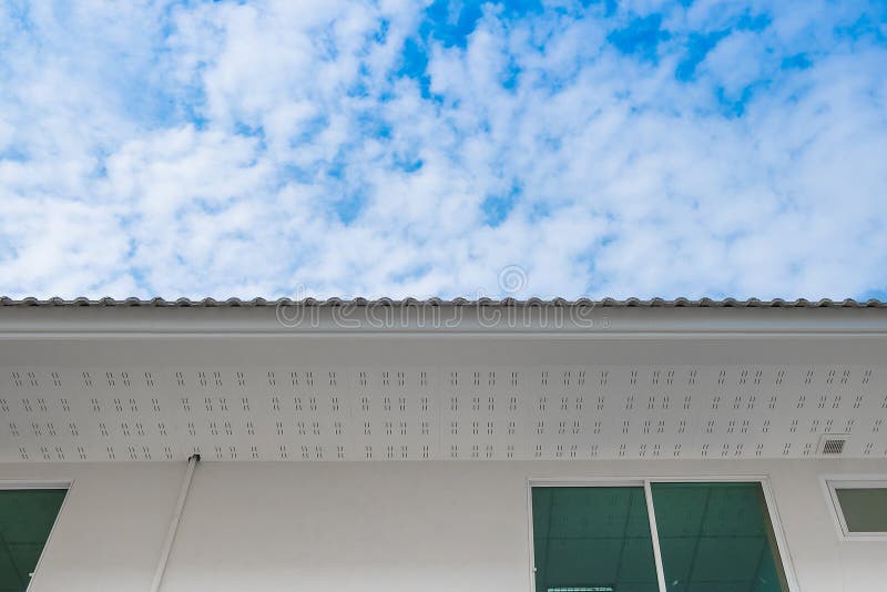 White Eaves with Ceiling and Roof of Modern House Against Blue S Stock ...