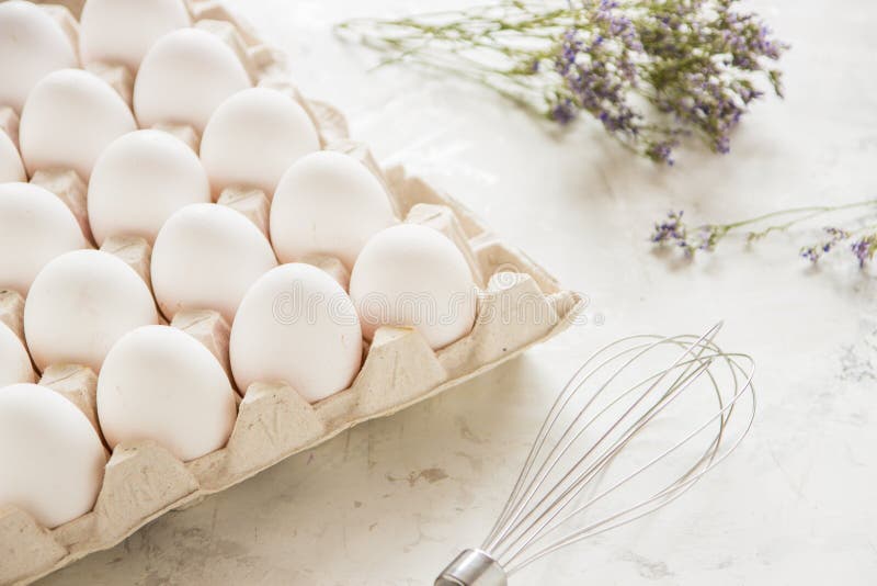 White Eggs in a Box on a Light Background Stock Photo - Image of ...