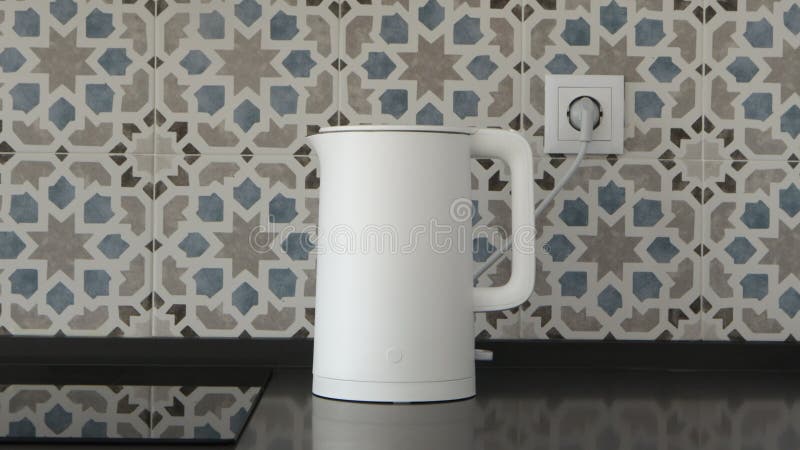 White Electric Kettle Boiled with Steam in Modern Kitchen Turn Off ...