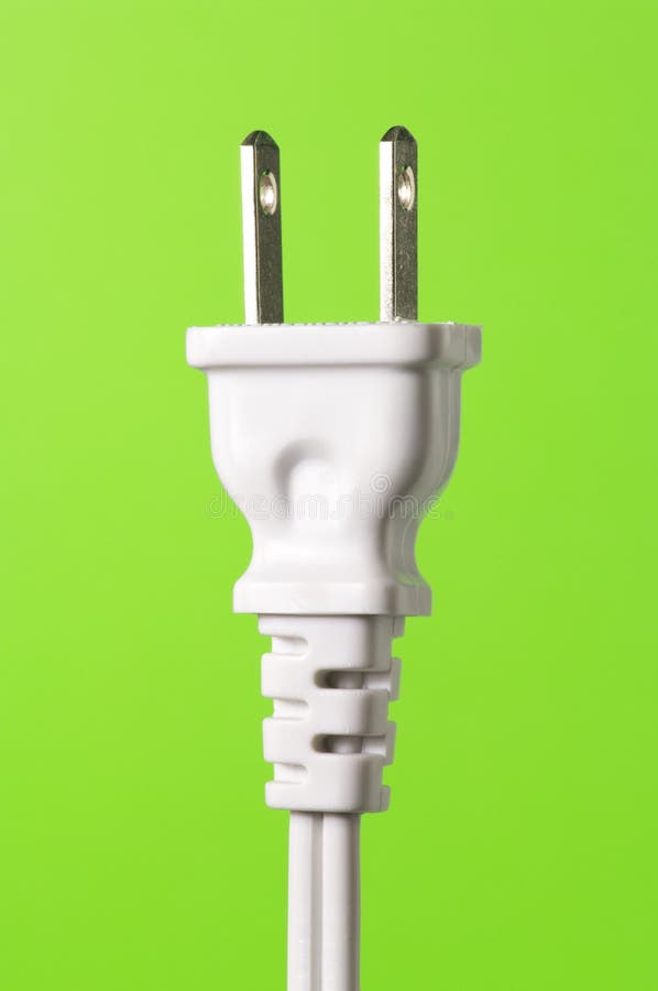 White Electric Plug on Green Background (vertical) Stock Photo - Image ...