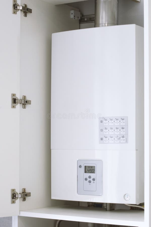 White Electric Water Heater with Electronic Panel Mounted in a Kitchen ...