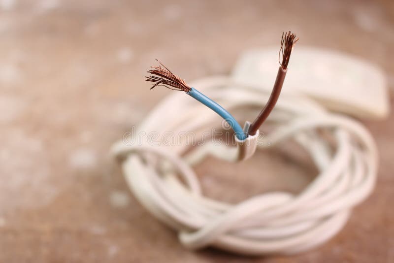 White Electric Wire with a Socket in the Background Stock Image - Image ...