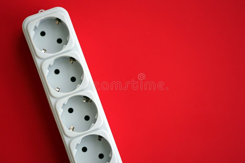 White Electrical Multi Plug Extender with European Socket on Bright Red ...
