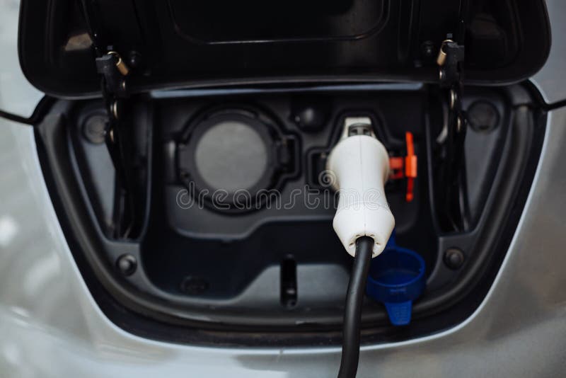 White Electrical Nozzle Charging an E-car Stock Image - Image of energy ...