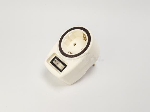 White Electrical Outlet Adapter with Integrated on Off Switch on a ...
