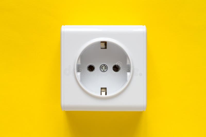 White Electrical Outlet on a Yellow Background. Stock Photo - Image of ...