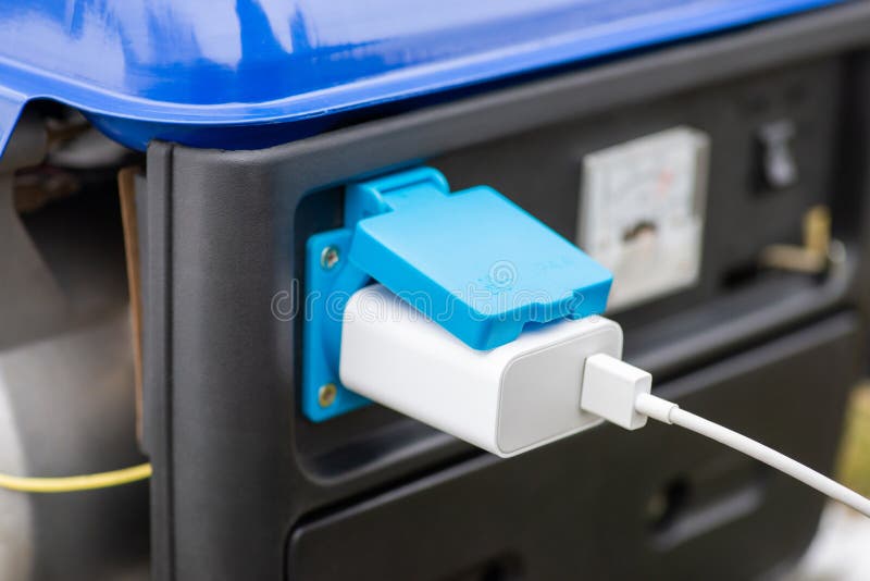 White Electrical Plug in the Outlet of Generator, Close Up Stock Photo ...