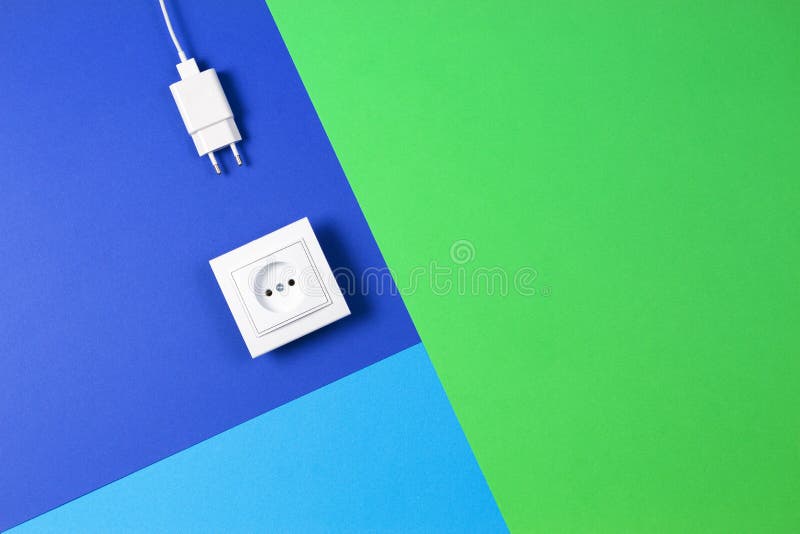 White Electrical Power Socket and Power Plug on Light Blue, Navy and ...