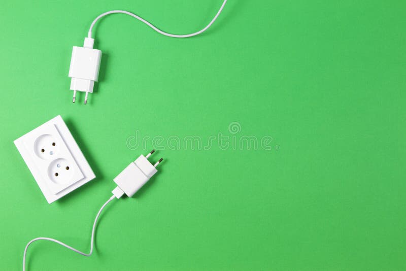 White Electrical Power Sockets and Power Plug on Light Green Background ...