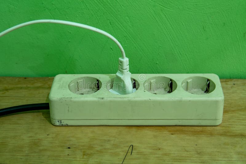 The White Electrical Socket on the Wooden Table Stock Image - Image of ...