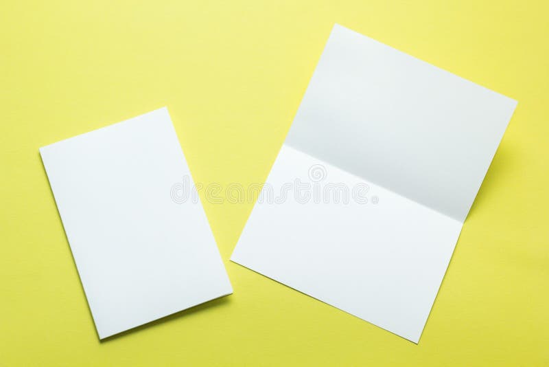 White Empty Card on Yellow Background To Replace Your Design. Open and ...