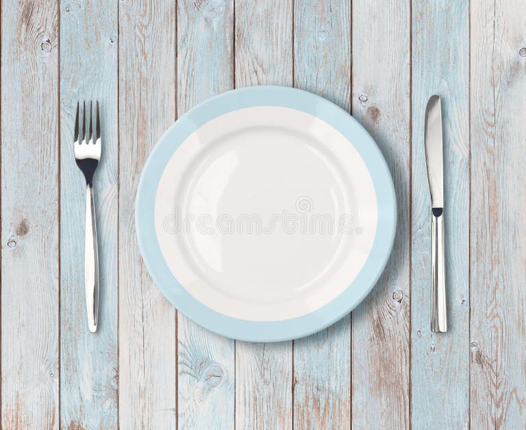 White Empty Dinner Plate with Blue Border on Wooden Table Stock Image ...