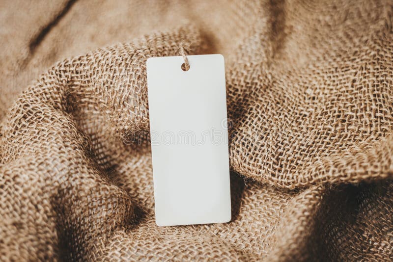 White Empty Label Tag on Vintage Burlap Background Stock Image - Image ...