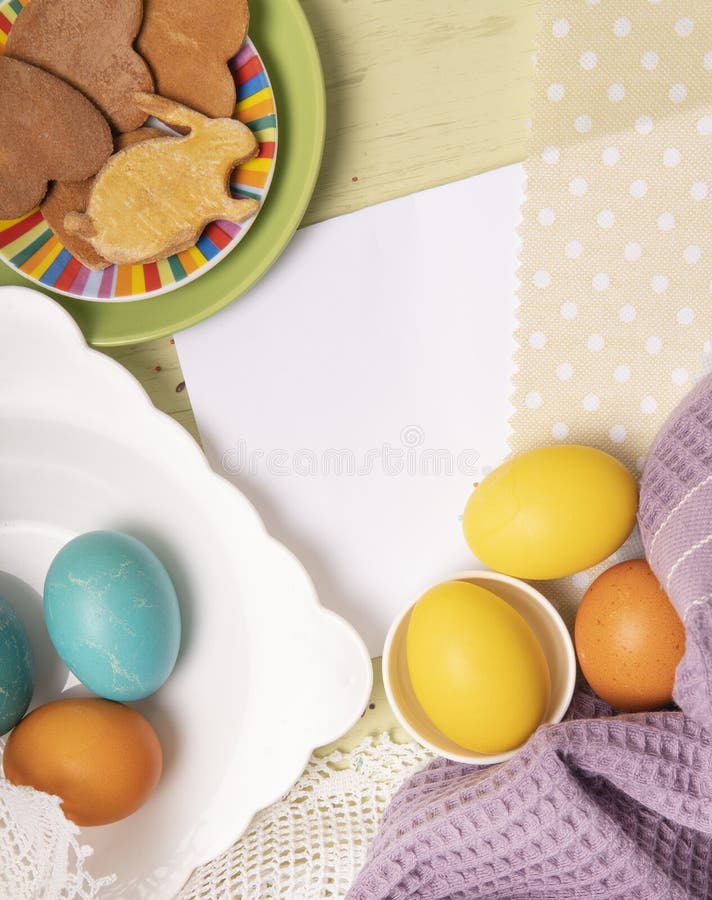 White Empty List with Easter Colored Eggs and Holiday Homemade Cookies ...