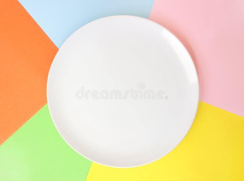 White Empty Plate on Colored Background, Place for Text, Top View Stock ...