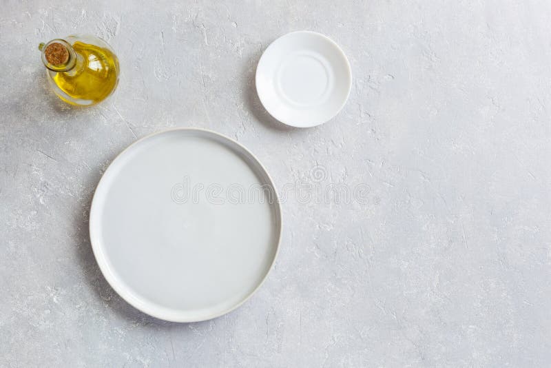 White Empty Serving Dish, Small Plate and Olive Oil Pitcher, Top View ...