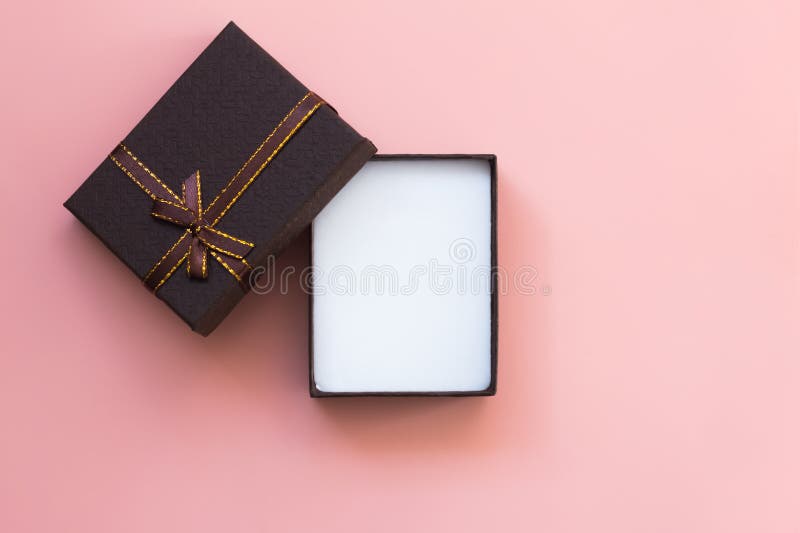 Open Brown Gift Box with Ribbon on Pink Background. Stock Image - Image ...