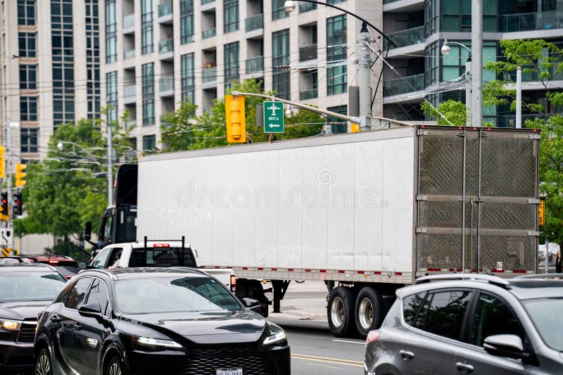 White Empty Trailer of a Truck in Traffic Stock Image - Image of ...