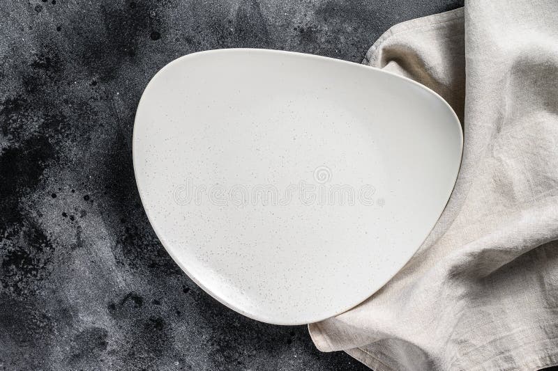 White Empty Triangular Plate, Restaurant Background. Black Background ...