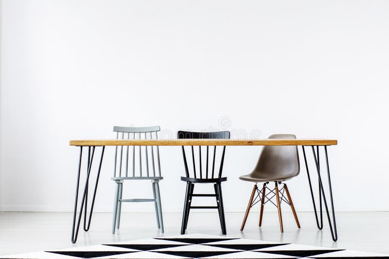White Wall Behind Long Wooden Table with Chairs, Real Photo with Copy ...