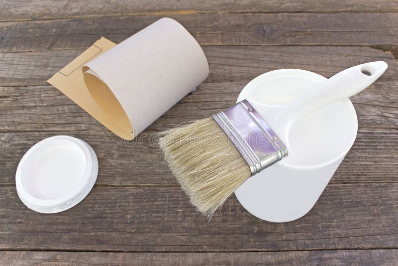 White Enamel Paint with Brush and Sandpaper Stock Image - Image of ...