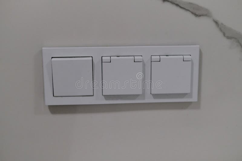 White European Light Switch on Gray Tile Wall Stock Image - Image of ...