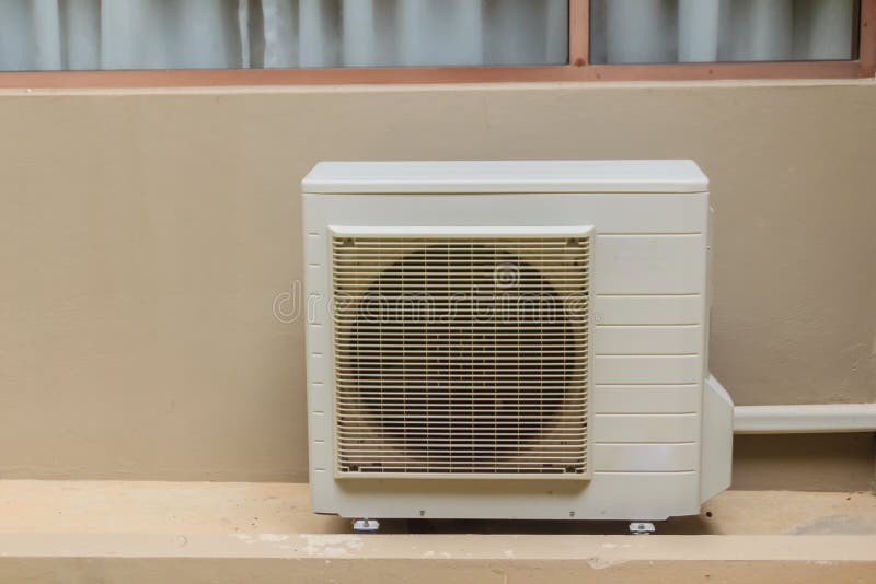 White External Split Wall Air Conditioner Compressor Unit Installed on ...