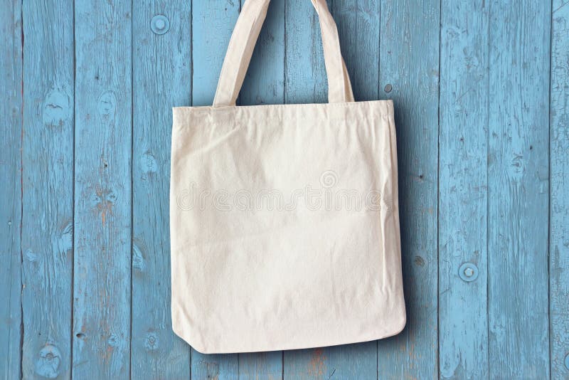 White Fabric Bag Hanging on the Blue Wall Mocap Stock Image - Image of ...