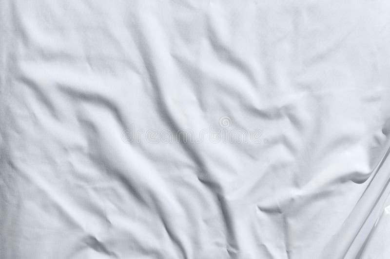 White Fabric with Soft Wrinkles Creating an Abstract Texture Background ...