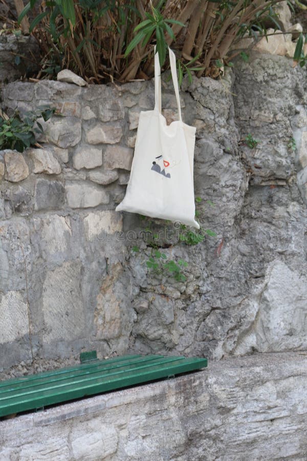 White Fabric Tote Bag Hanging on a Tree Stock Photo - Image of outside ...