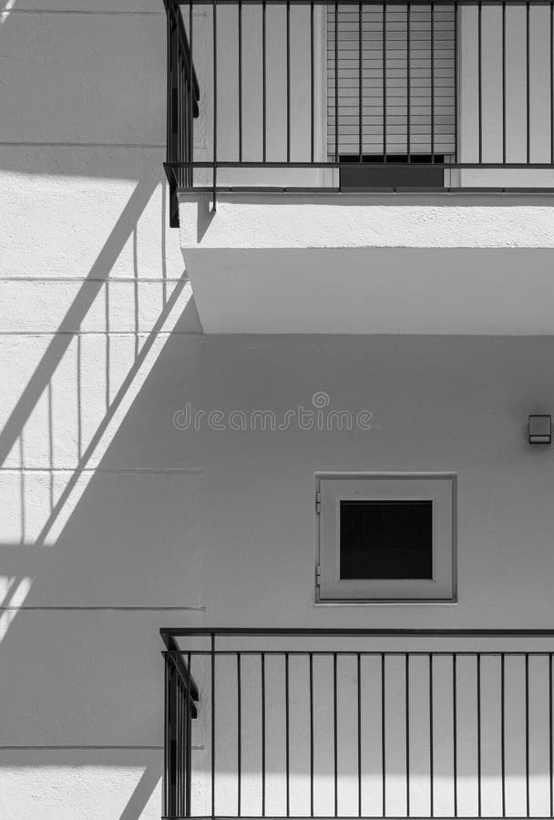 White Facade of a Flat Building with Minimalist Design and Small ...