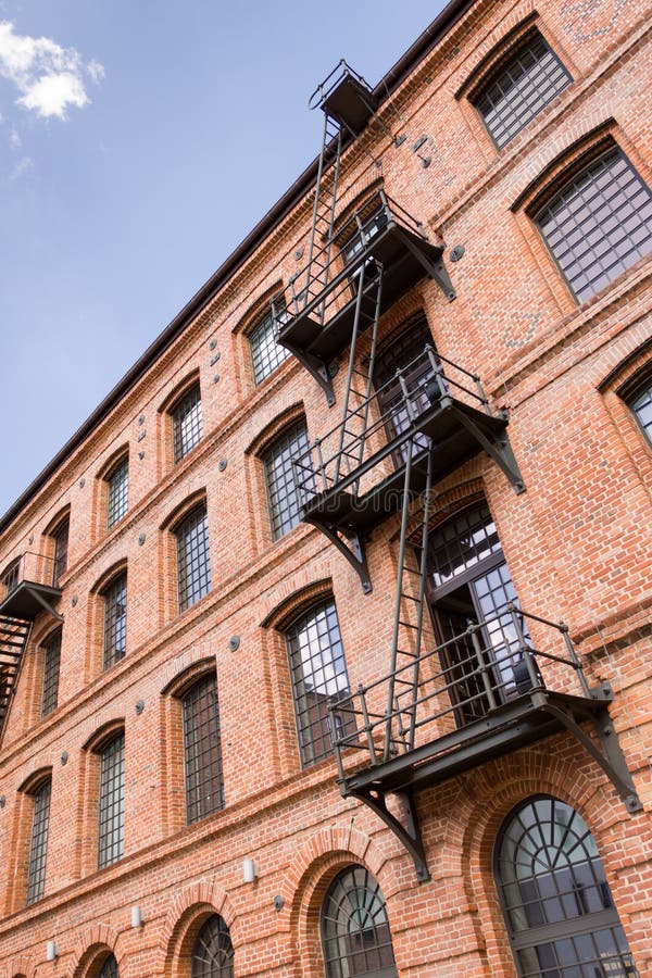 White factory in Lodz stock image. Image of pavement - 25198931