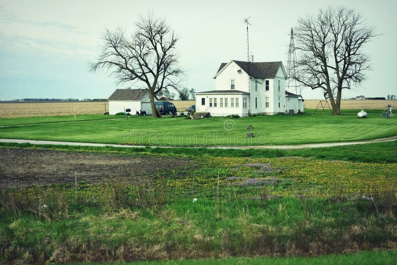 White Farm Buildings with Farm Equipment Stock Photo - Image of ...
