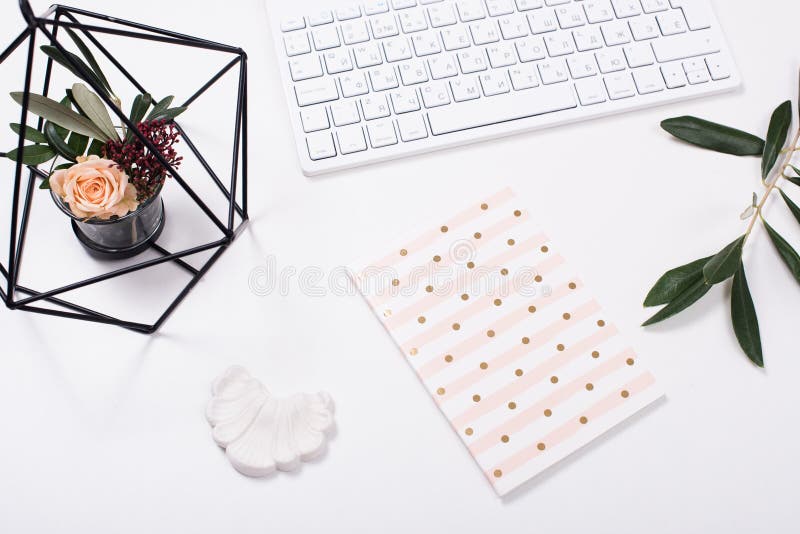 Feminine Workplace Concept in Flat Lay Style with, Flowers, Golden Pineapple, Notebooks on White ...