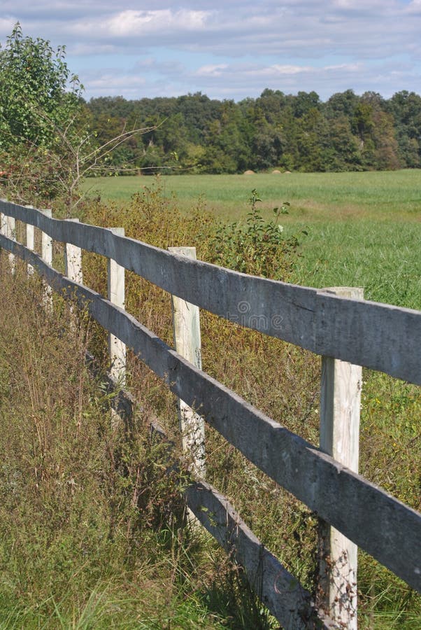 White fence around a field stock image. Image of fields - 45282207
