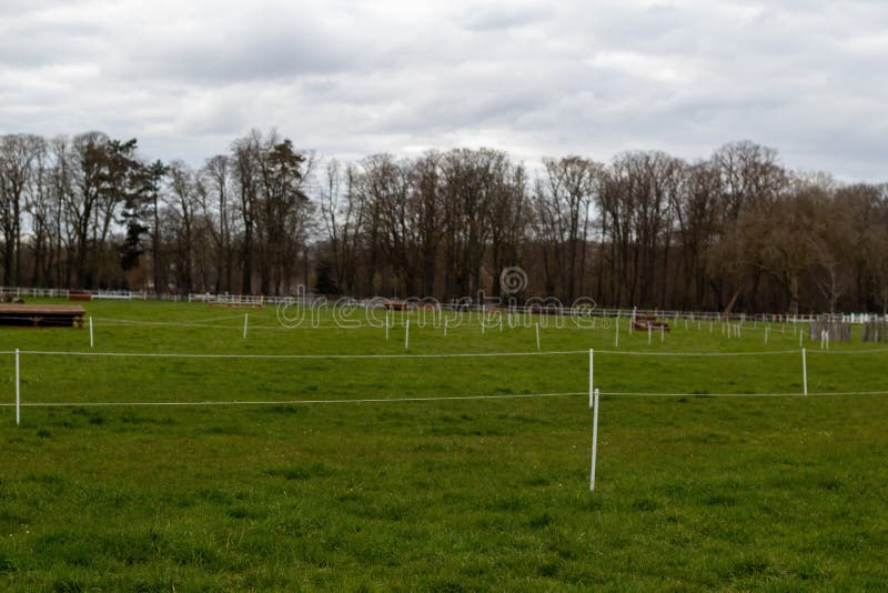 White fence in the field stock image. Image of grass - 268132719