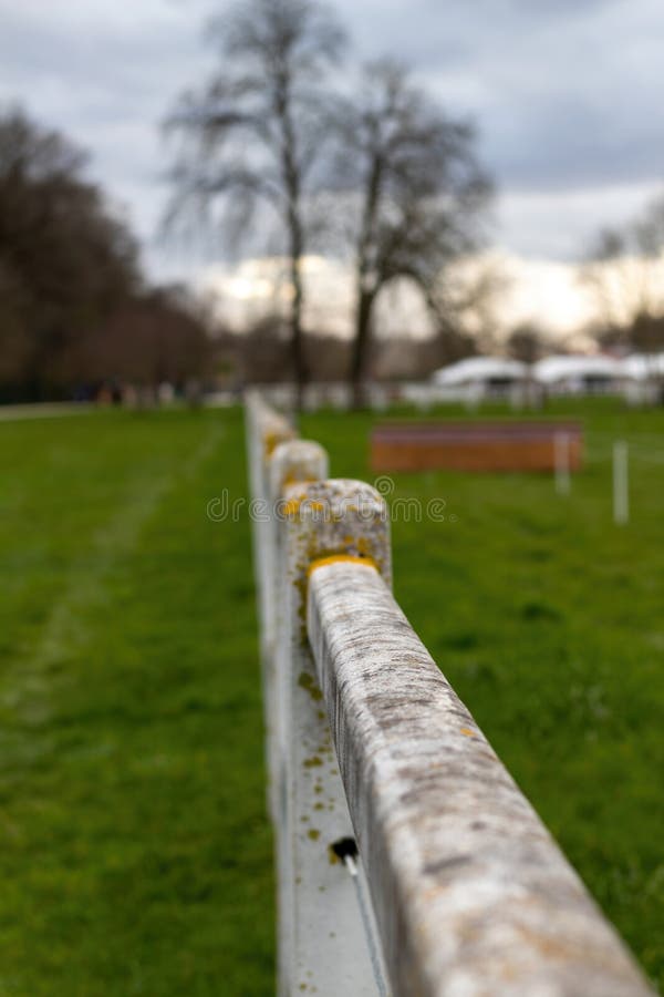 White fence in the field stock photo. Image of season - 268132724
