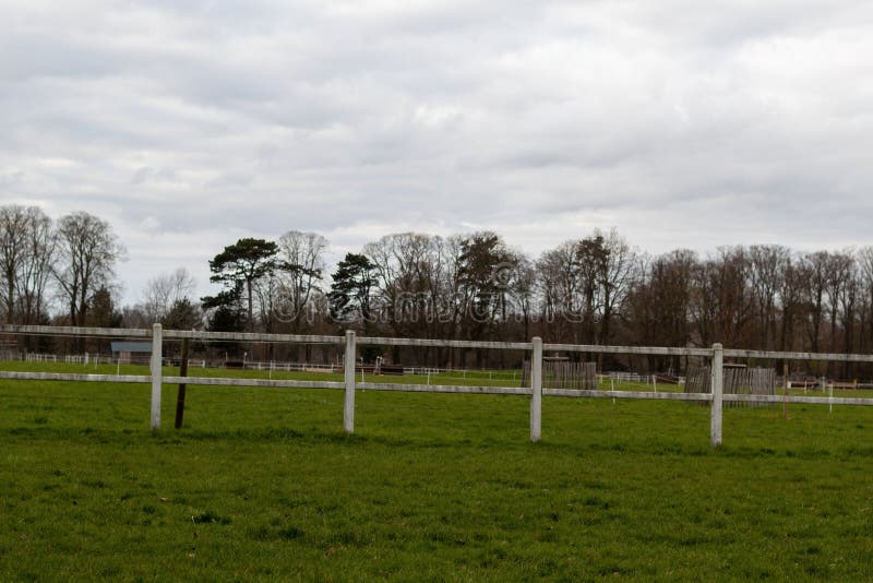 White fence in the field stock image. Image of scenic - 268132231