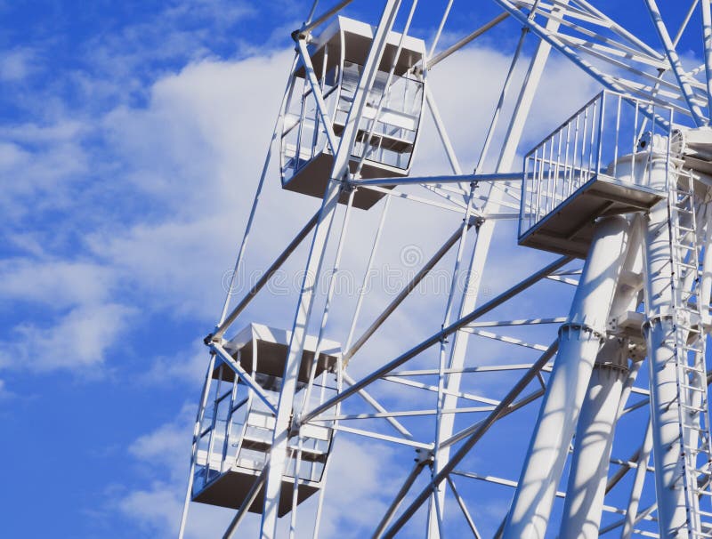 White Ferris Wheel Against the Blue . Ferris Wheel in the Park Stock ...
