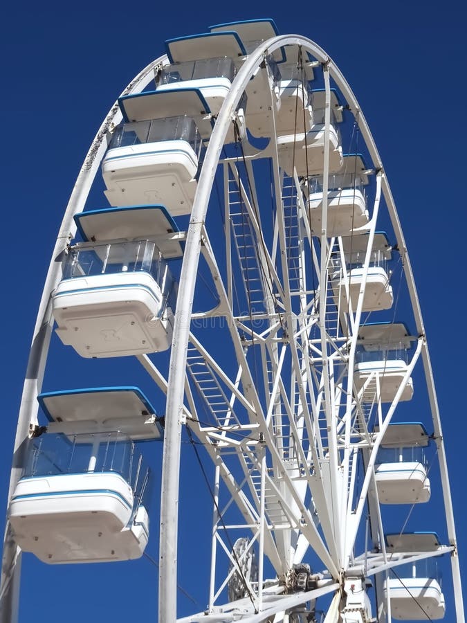 White Ferris Wheel with Blue Sky Stock Image - Image of wheels, grunge ...