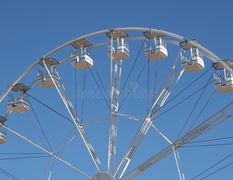 White Ferris Wheel with Empty Gondolas and Blue Sky Stock Image - Image ...