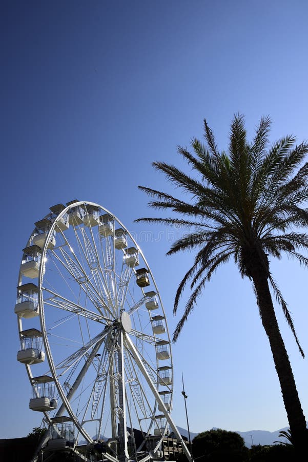 White Ferris Wheel at Sunset Stock Photo - Image of high, attraction ...