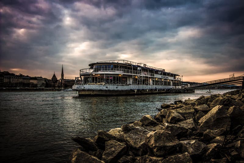 White Ferry Boat By Rocky Shore Stock Photo - Image of budapest ...