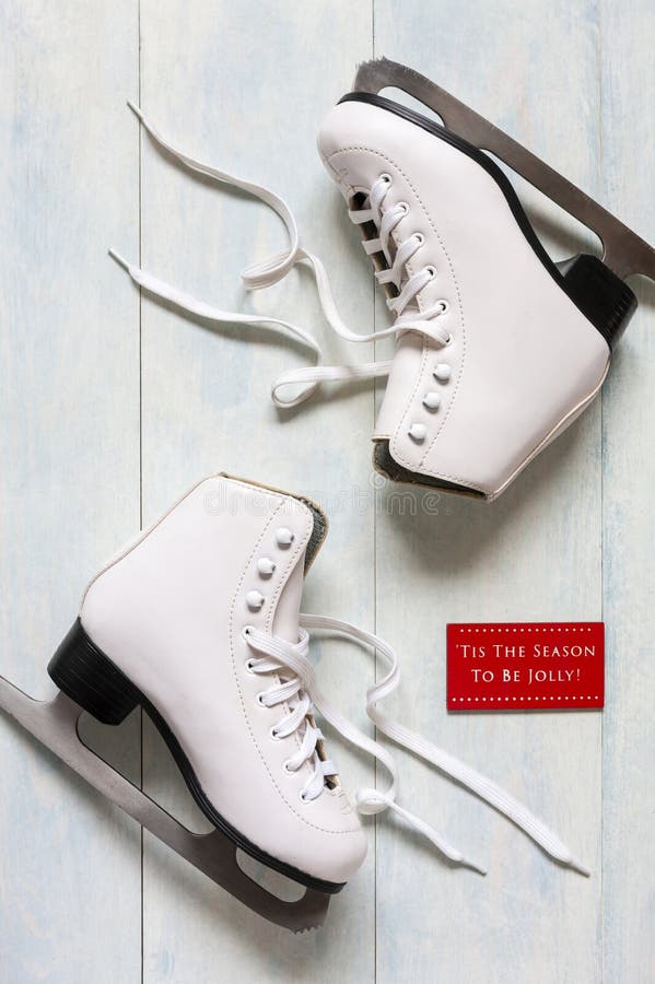 White Figure Skates on the Blue Light Background Stock Image - Image of ...