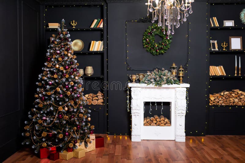 White Fireplace on Black Wall with Christmas Tree. Classic Christmas ...