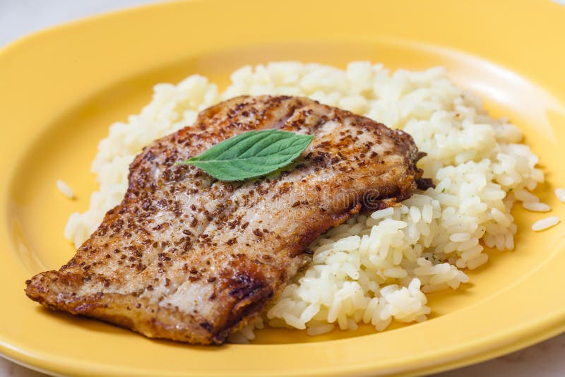 White Fish on Cumin Served with Rice Stock Photo - Image of food ...