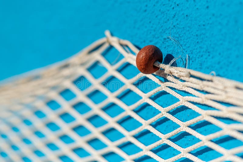 A White Fisher Net Hanging on a Blue Wall Stock Image - Image of marin ...