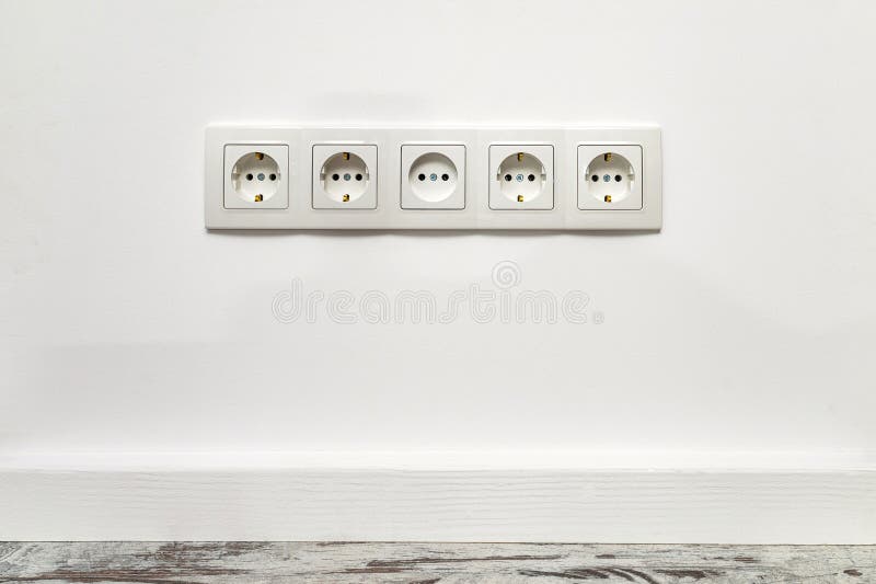 White Five-way Wall Power Socket on White Wall Stock Photo - Image of ...