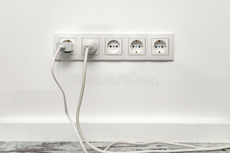 White Five-way Wall Power Socket on White Wall Stock Photo - Image of ...